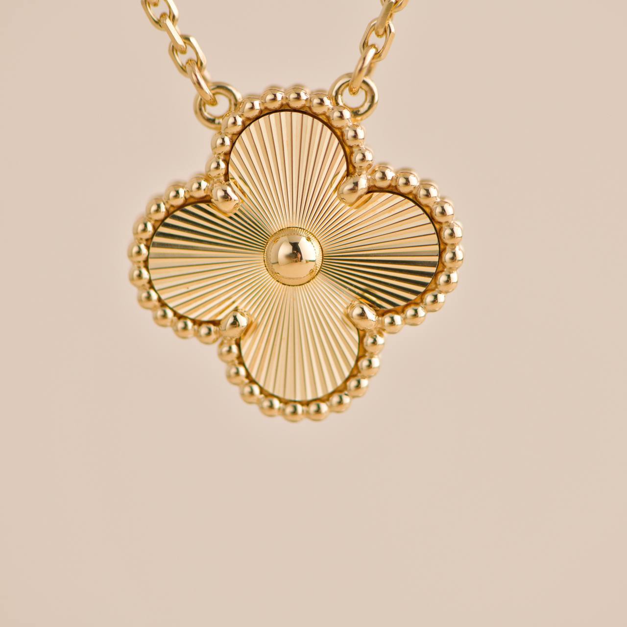 Van Cleef Arpels Vintage Alhambra Guilloche 18K yellow gold Pendant Dandelion Antiques